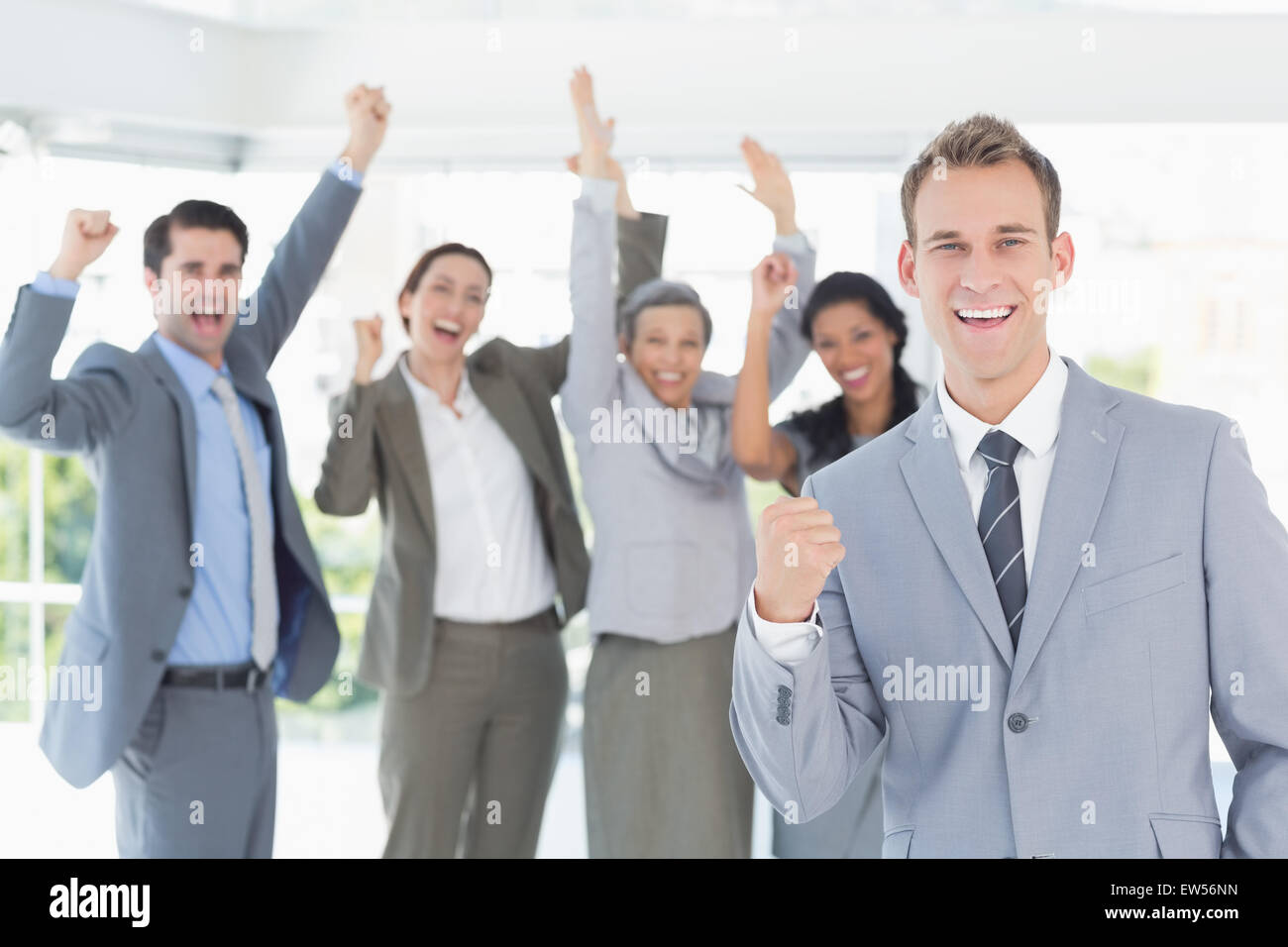 Business team celebrating a good job Stock Photo - Alamy