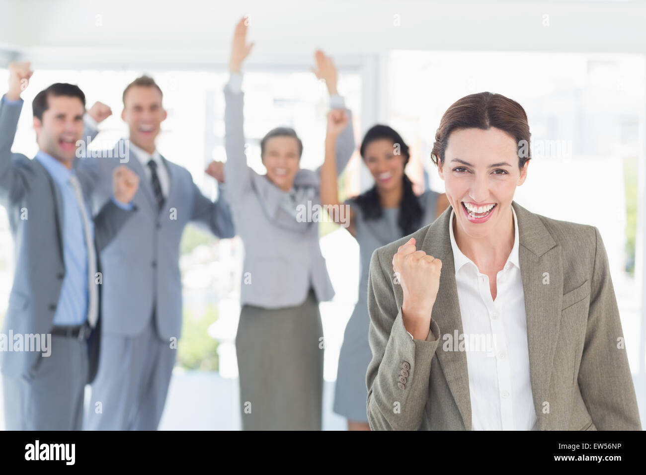 Business team celebrating a good job Stock Photo - Alamy