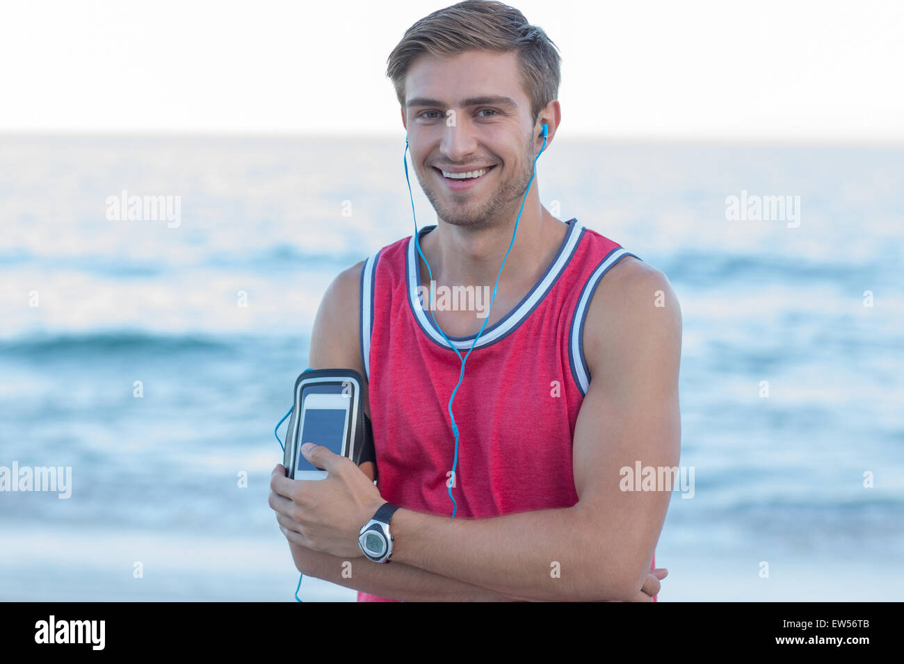 Handsome runner looking at camera Stock Photo - Alamy