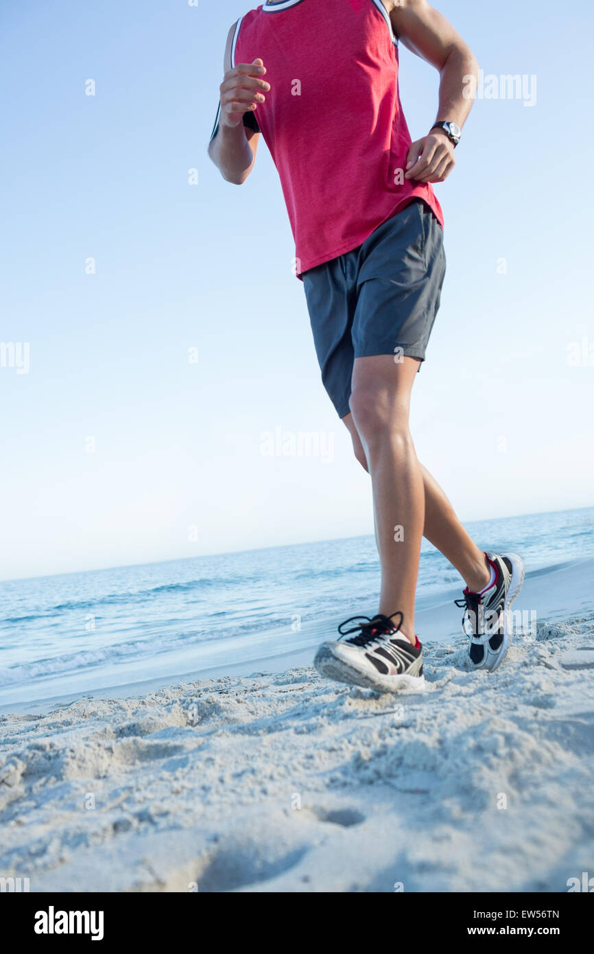 Fit man doing jogging Stock Photo - Alamy