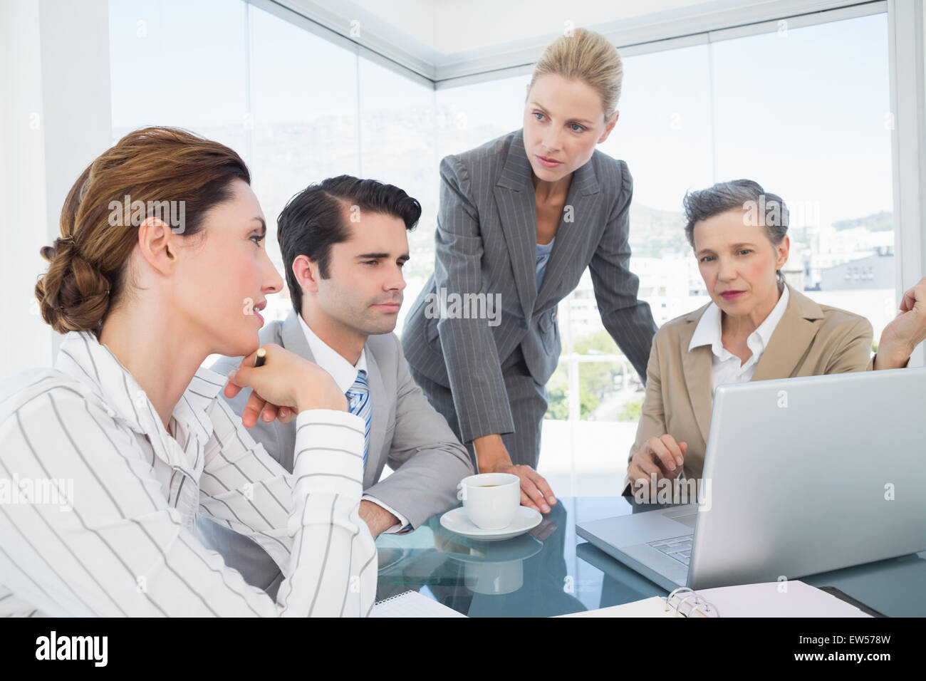 Business team working together on laptop Stock Photo - Alamy