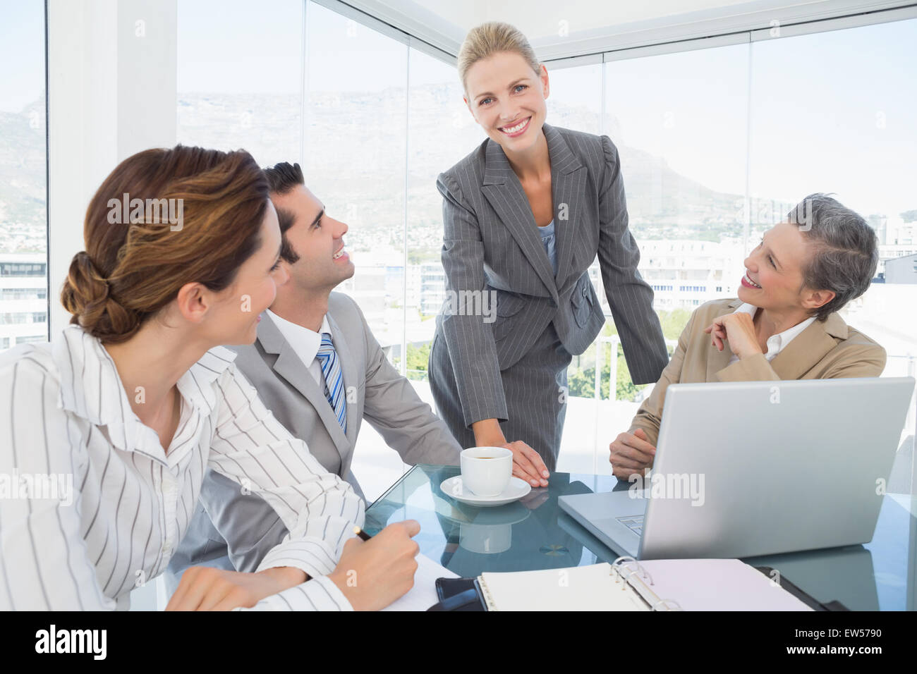 Business team working together on laptop Stock Photo - Alamy