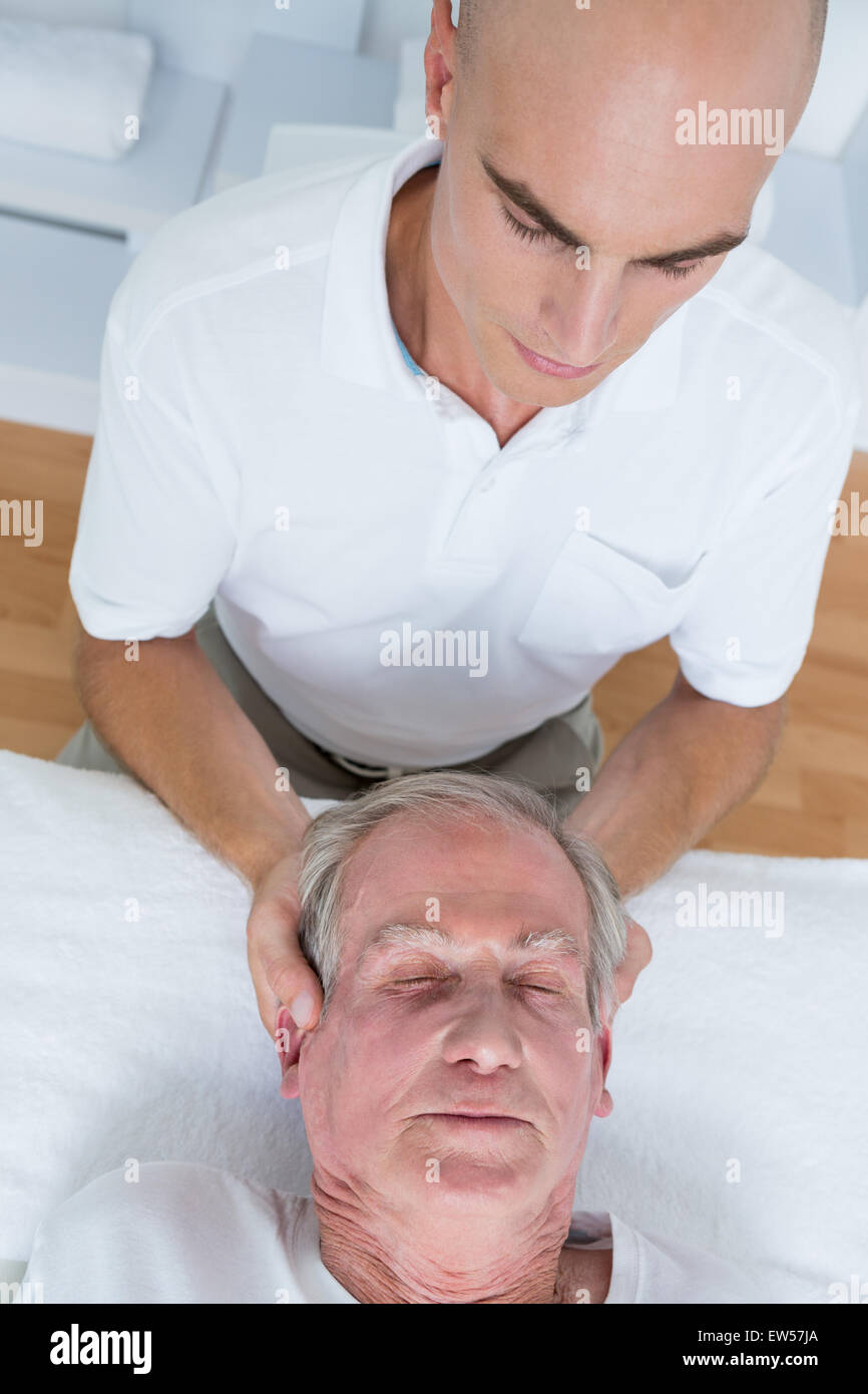 Man receiving neck massage Stock Photo - Alamy