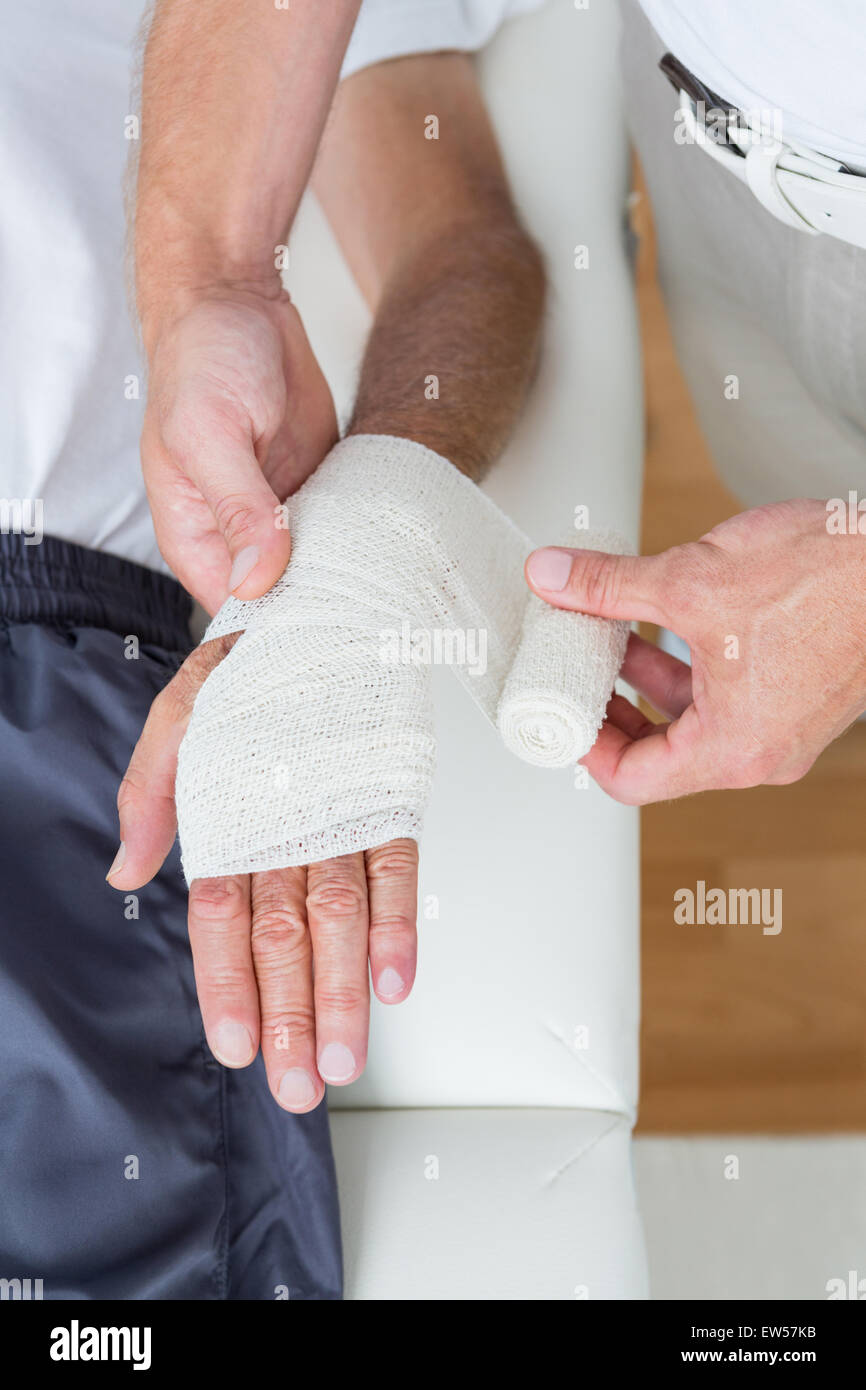 Hand bandaging hi-res stock photography and images - Alamy