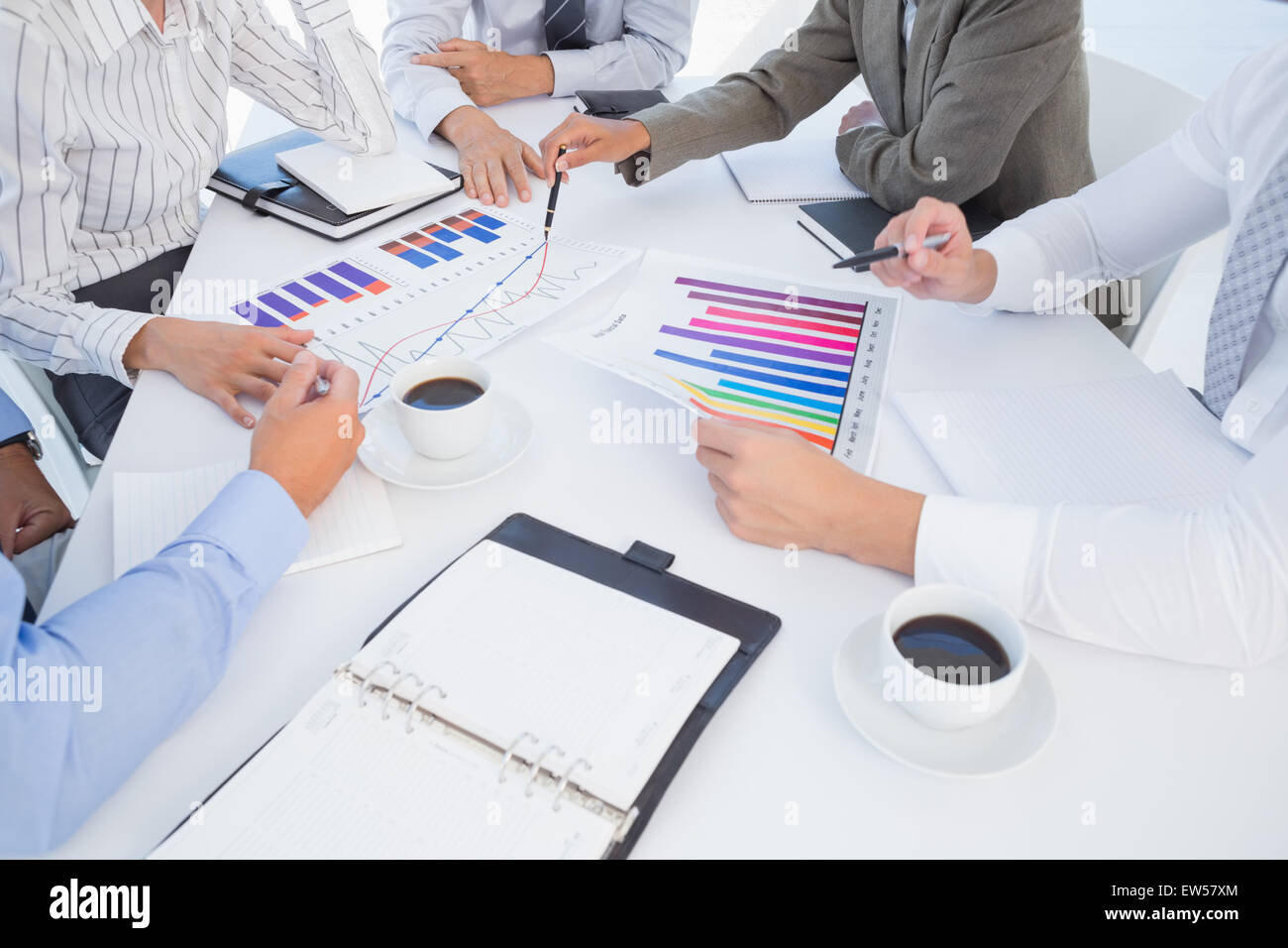 Businessman analyzing graphs hi-res stock photography and images - Alamy