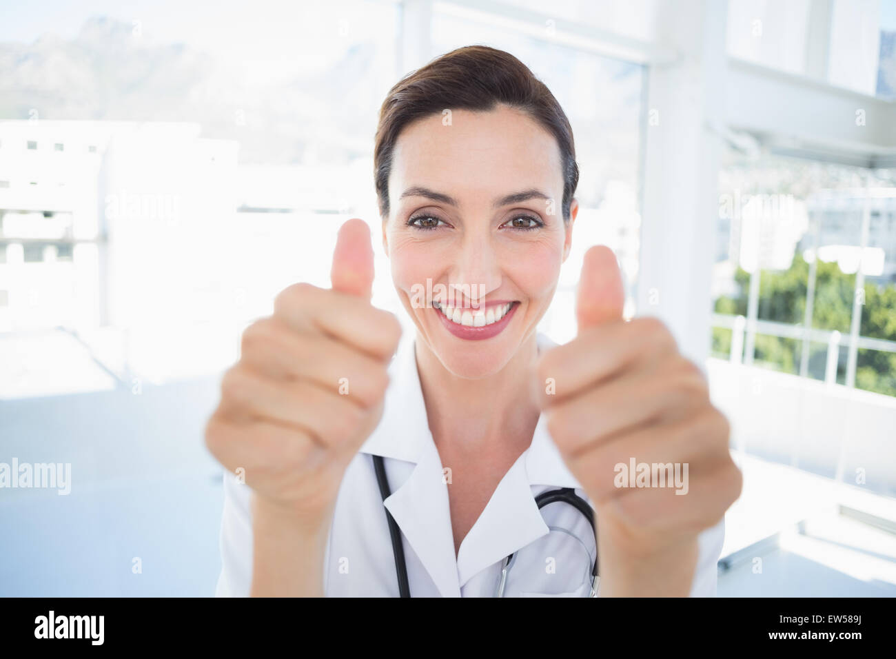 Smiling doctor looking at camera Stock Photo - Alamy
