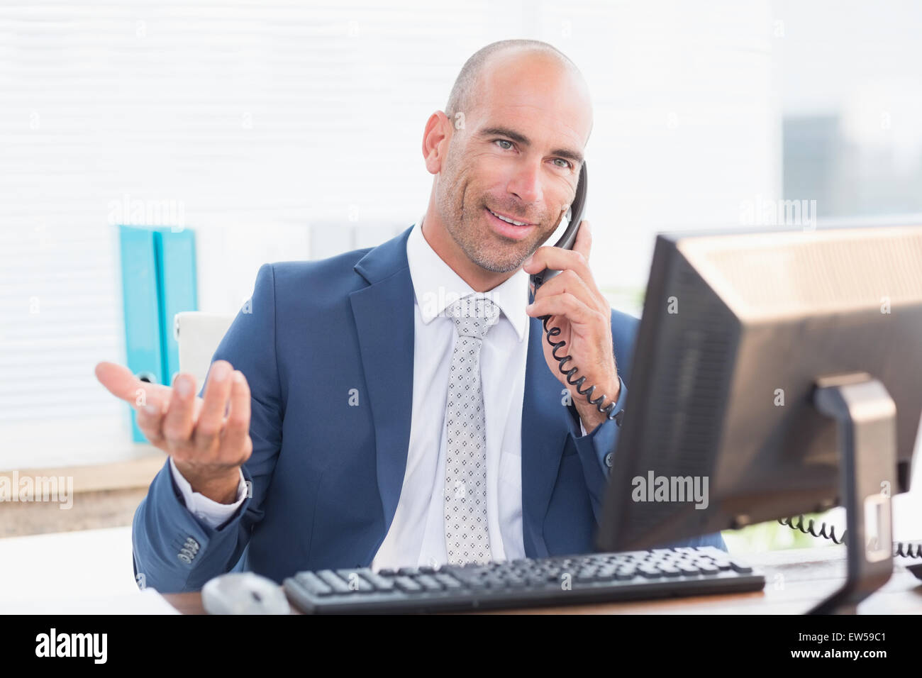 Businessman on the phone Stock Photo - Alamy