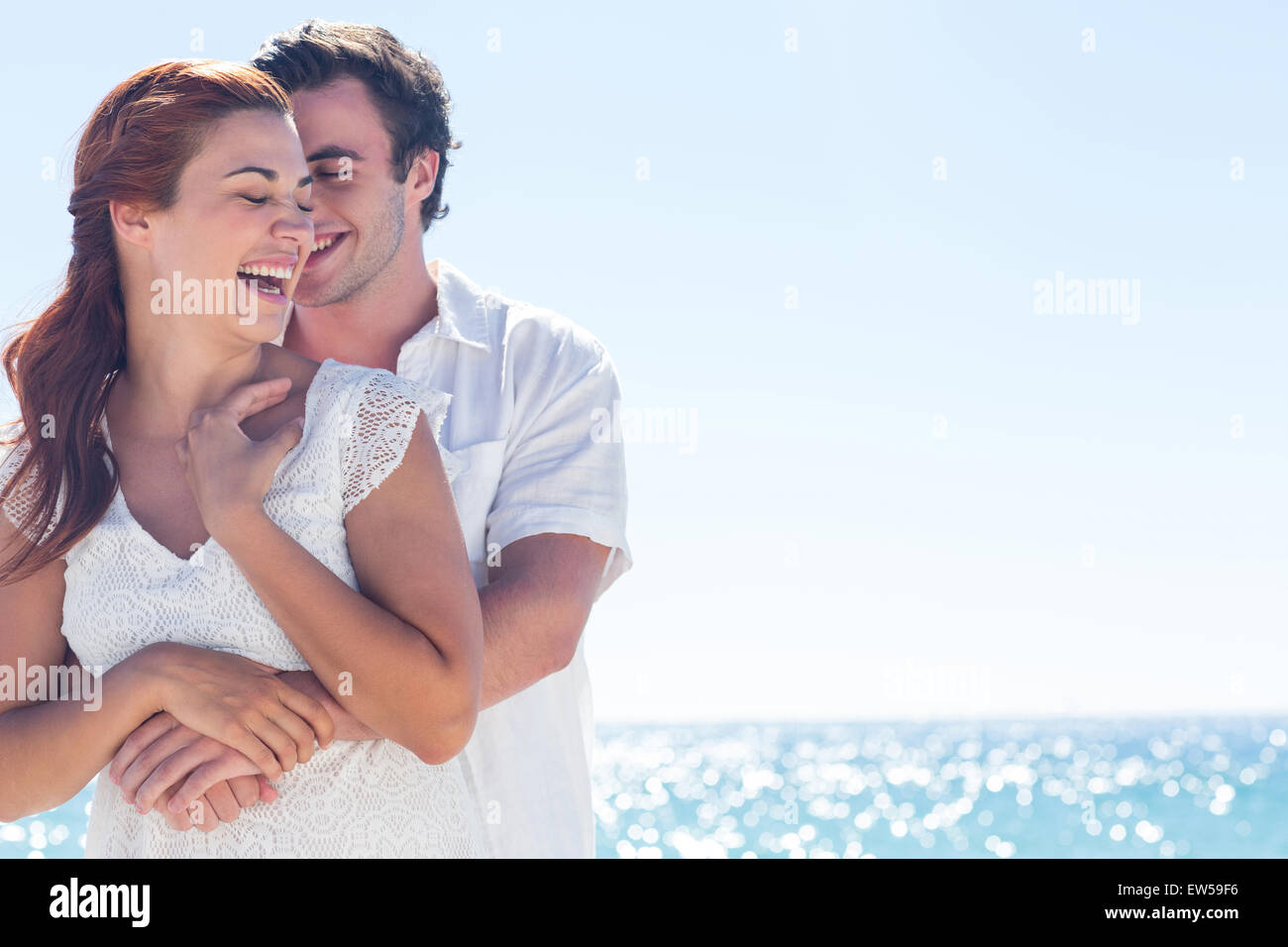 Together male female laughing hugging hi-res stock photography and ...