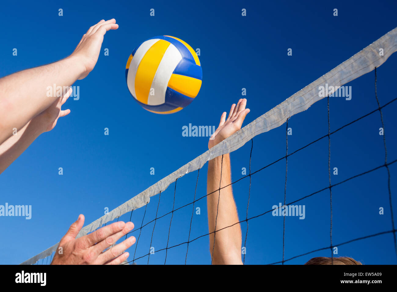 Woman playing volleyball hi-res stock photography and images - Alamy