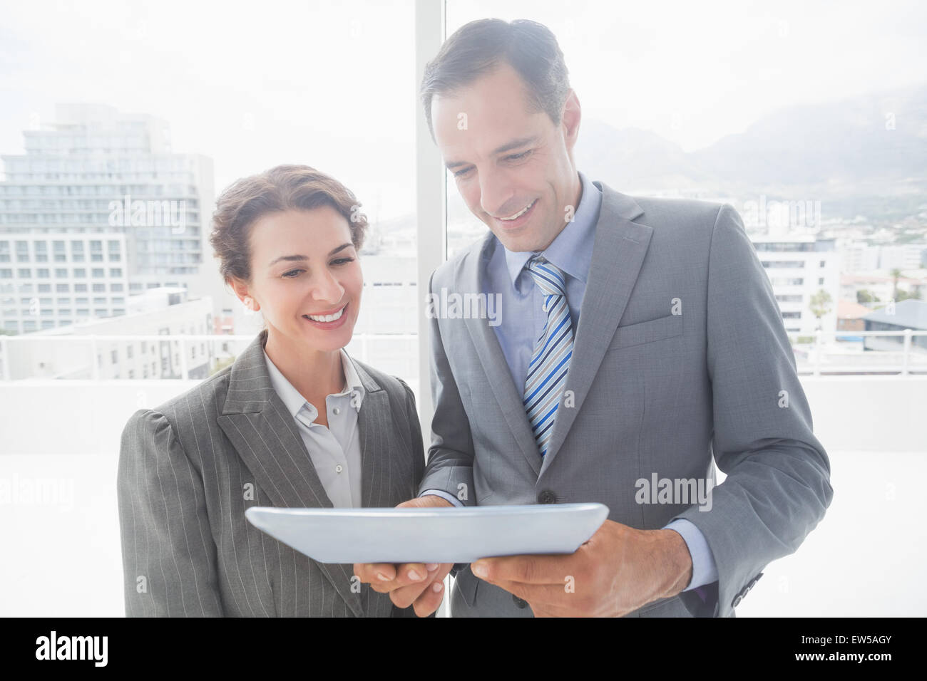 Business partners working together Stock Photo - Alamy