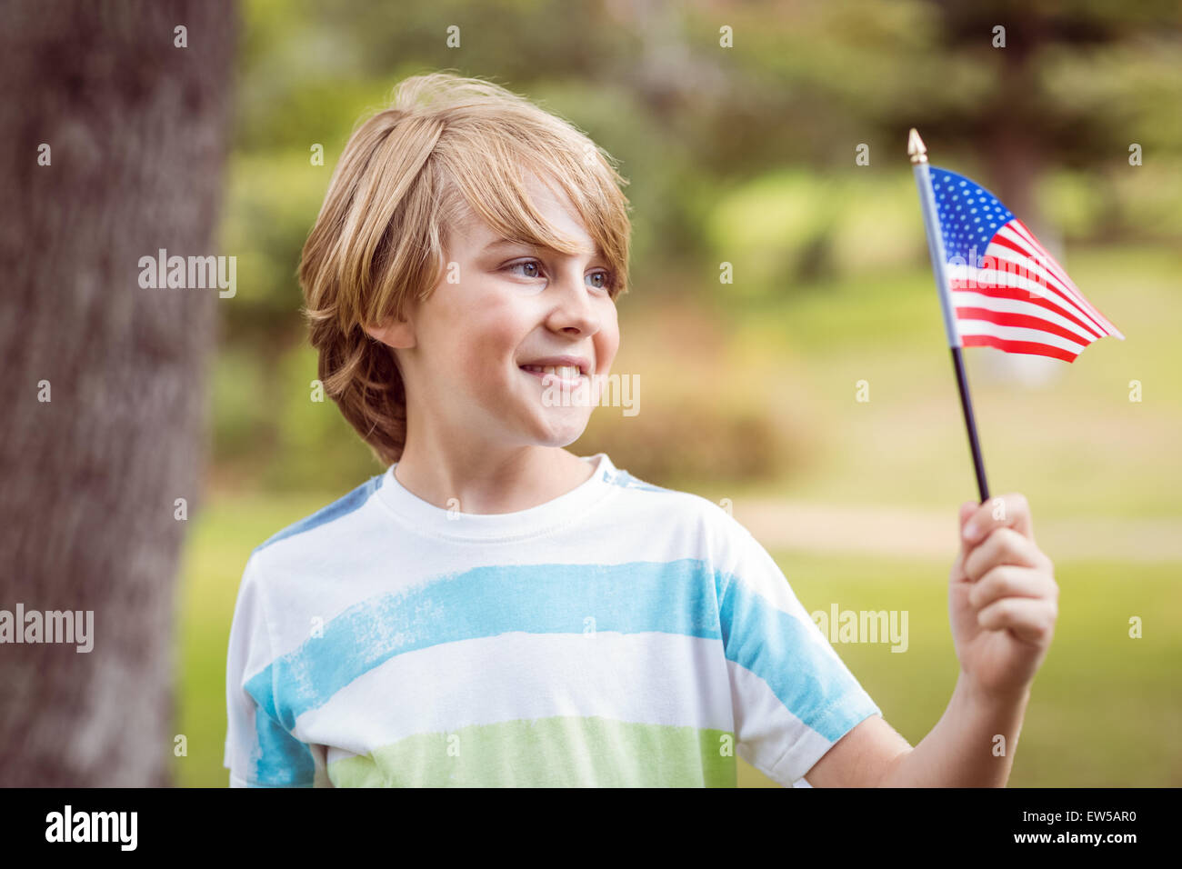 Child holding flag hi-res stock photography and images - Alamy