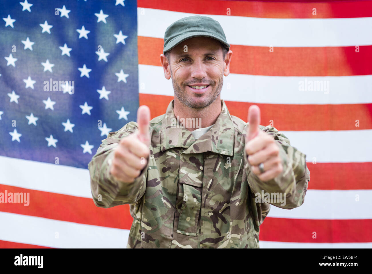 Soldier looking camera thumbs up hi-res stock photography and images ...