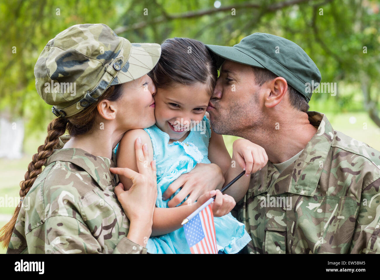Army parents reunited with their daughter Stock Photo - Alamy