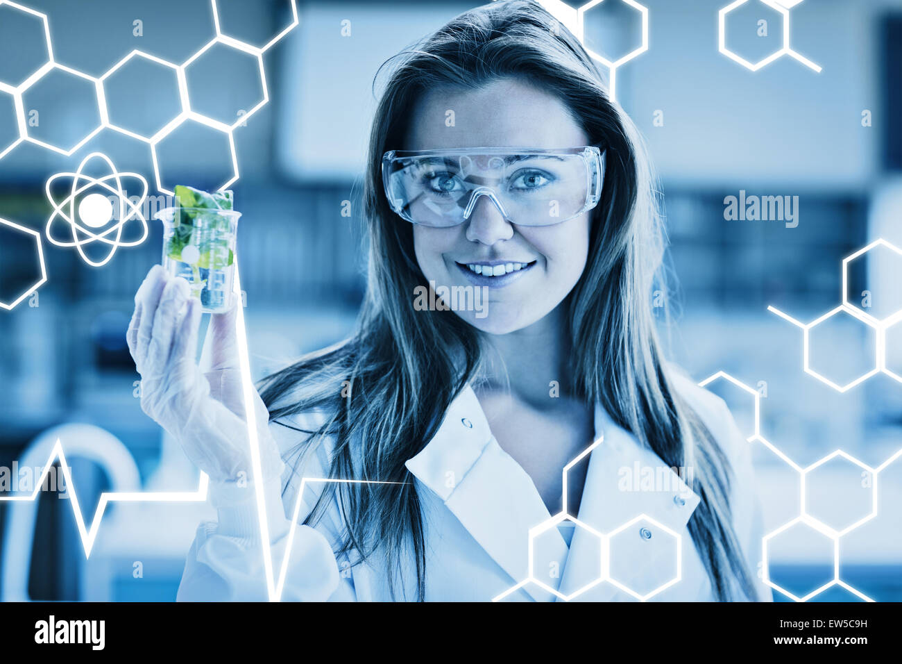 Young science student looking beaker hi-res stock photography and ...