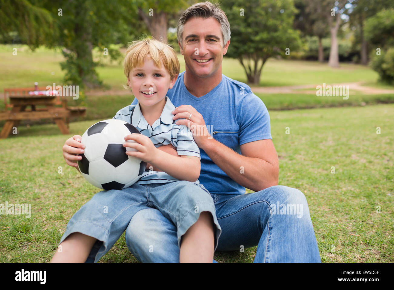Happy father with his son at the park Stock Photo - Alamy