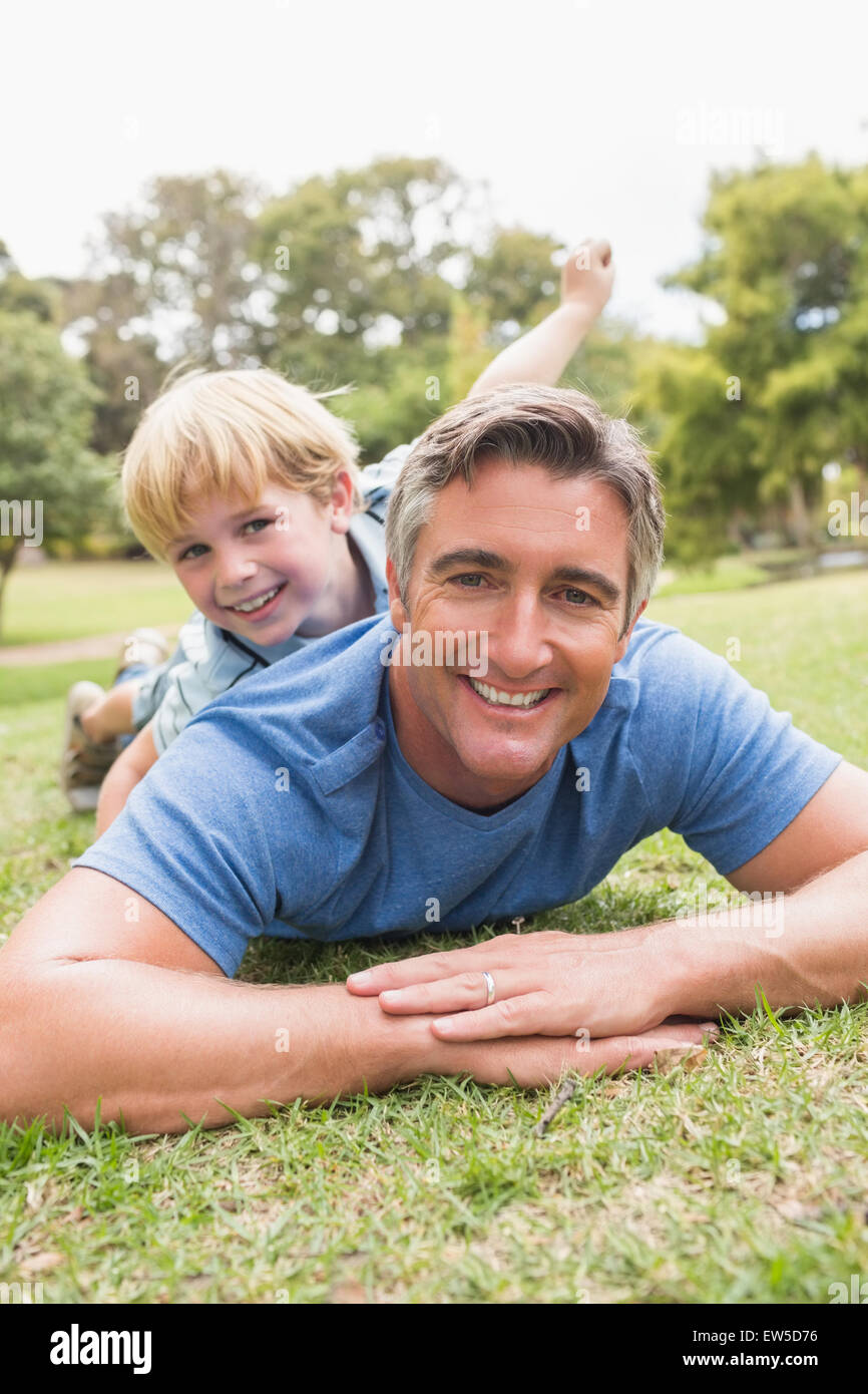 Happy father and his son smiling at camera Stock Photo - Alamy