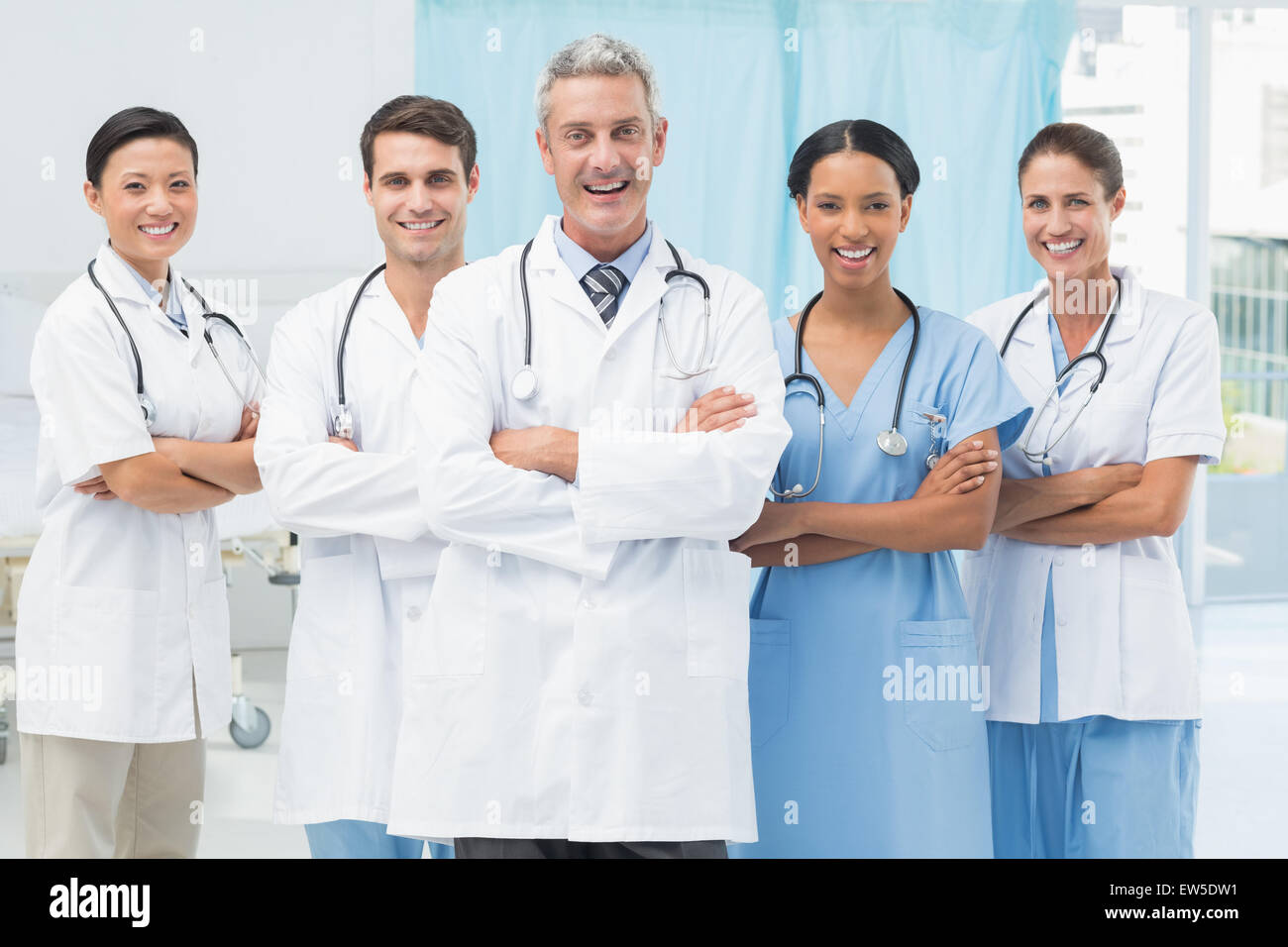 Confident male and female doctors Stock Photo - Alamy