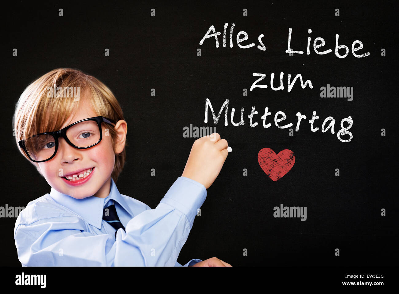 Composite image of cute pupil writing Stock Photo - Alamy