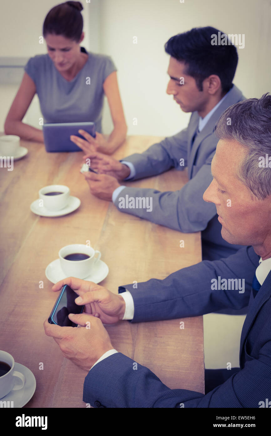 Business people in meeting with new technologies Stock Photo - Alamy