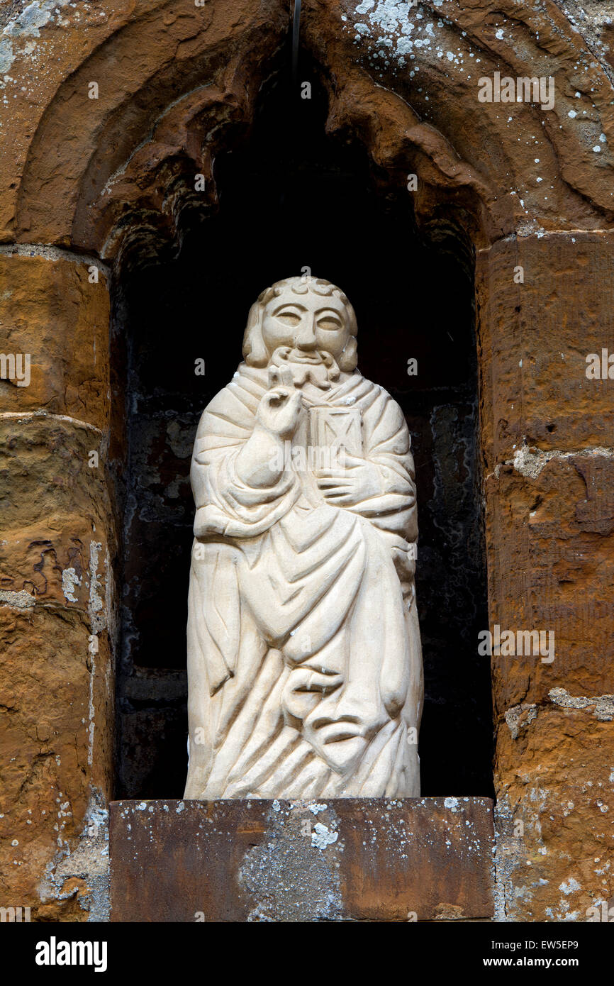 Statue of St Andrew over south door of St. Andrew`s Church, Harlestone ...