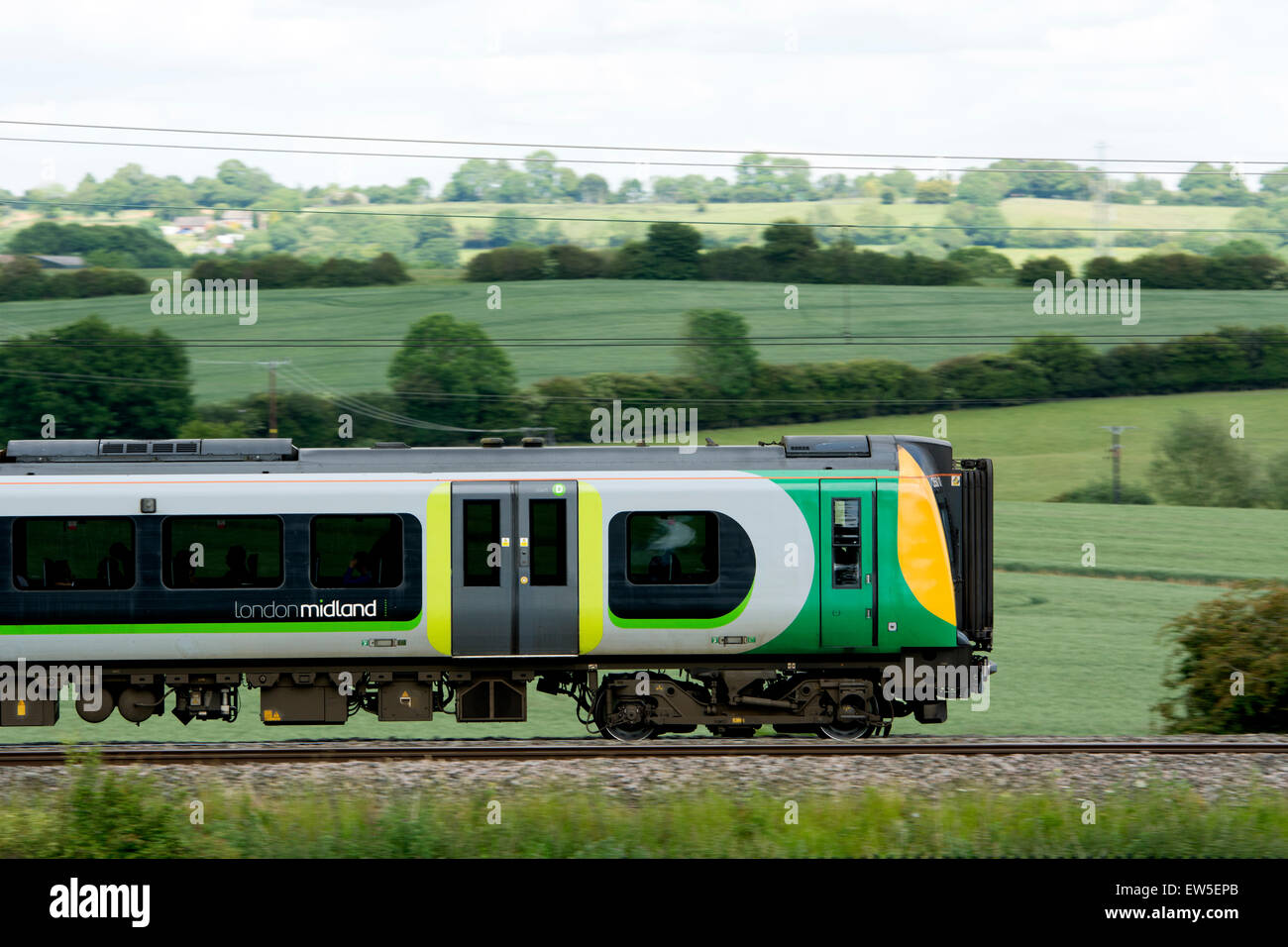 London Midland train on the West Coast Main Line, Northamptonshire, UK ...
