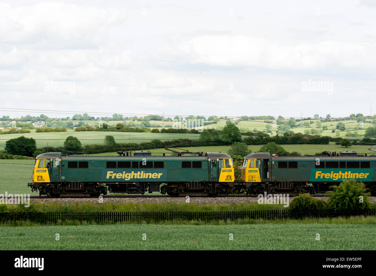 Two class 86 electric locomotives pulling a train on the West Coast ...