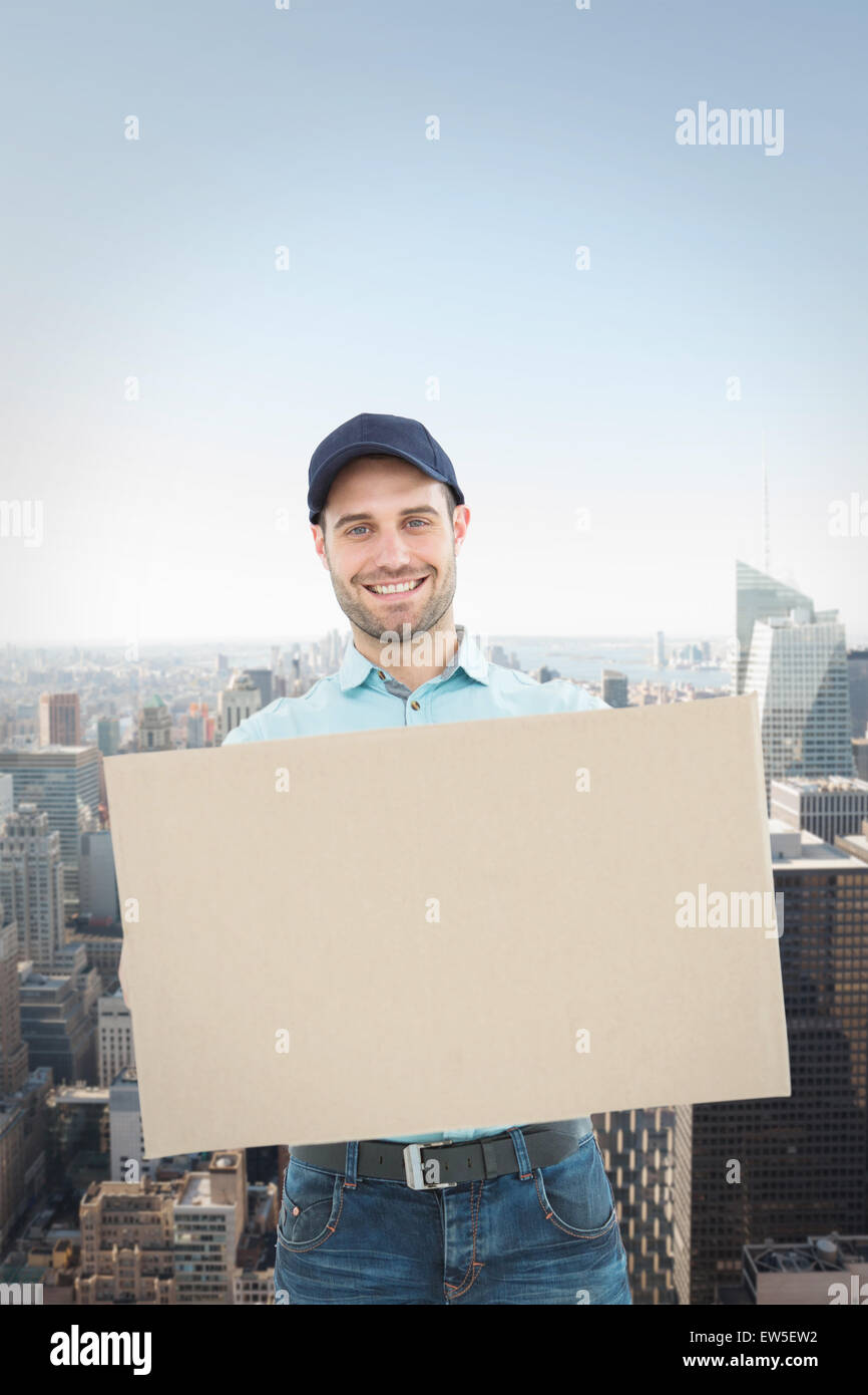 Delivery man delivering cardboard box hi-res stock photography and ...