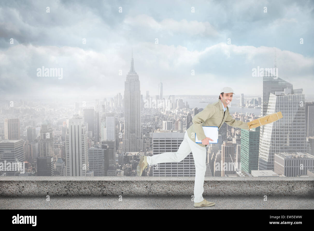 Composite image of happy delivery man running while holding parcel ...