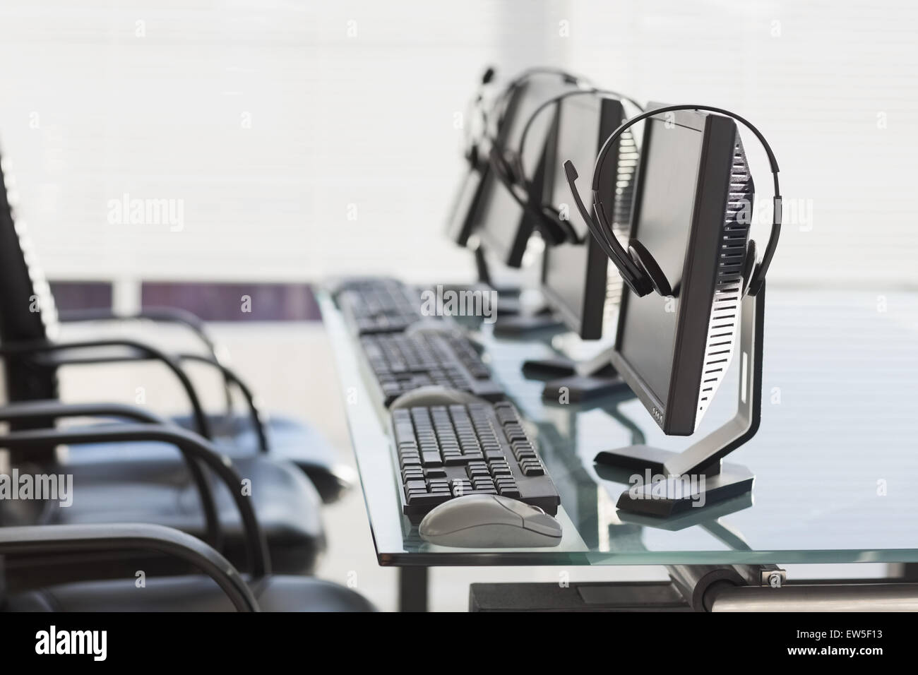 Computer with headsets Stock Photo - Alamy