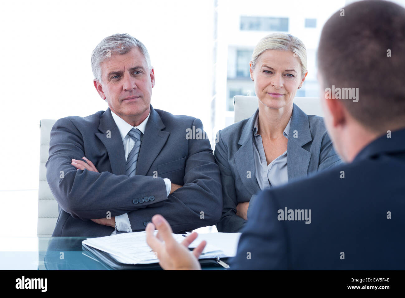 Business people conducting an interview Stock Photo - Alamy