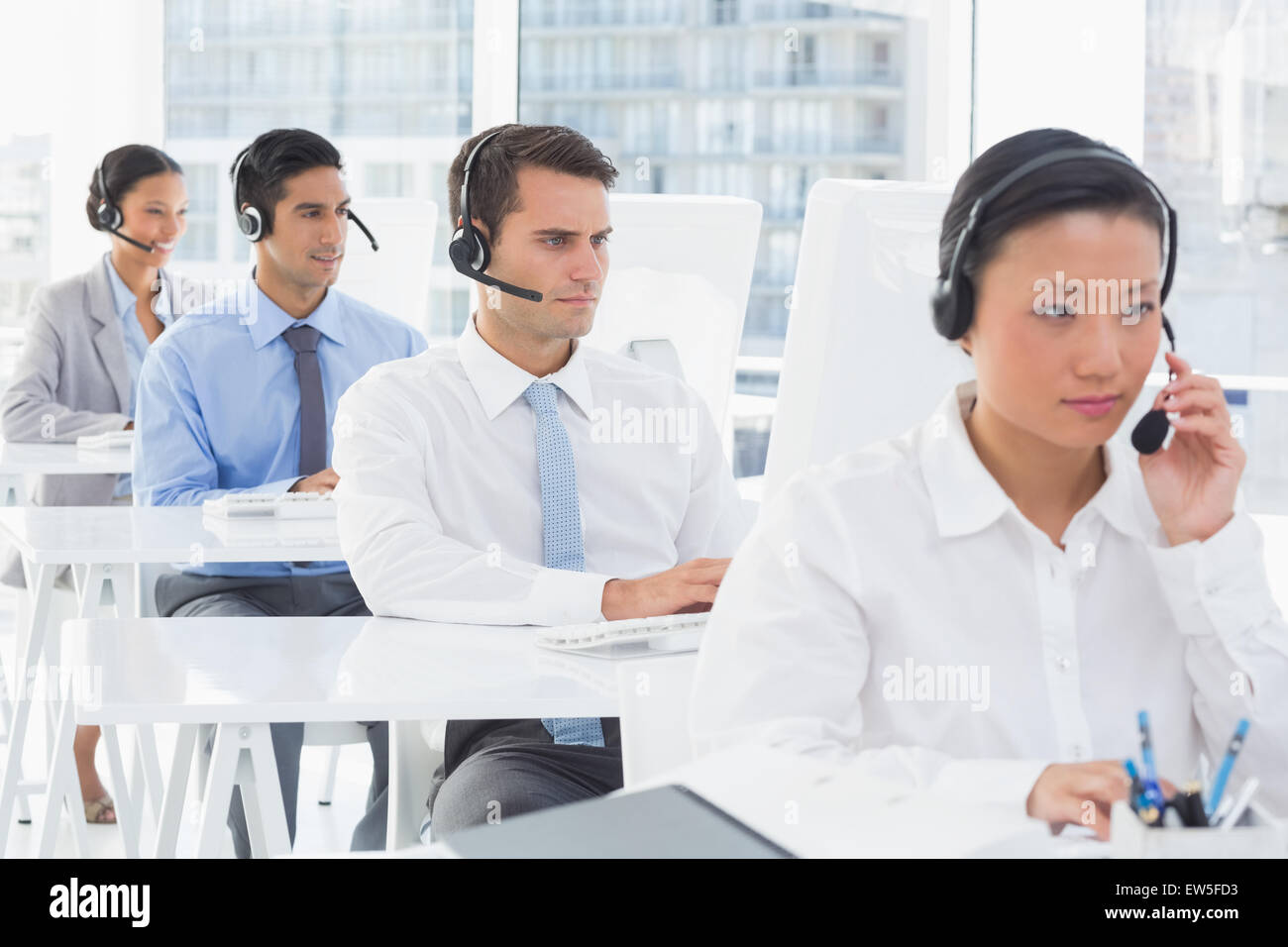 Concentrate work team using computer Stock Photo - Alamy