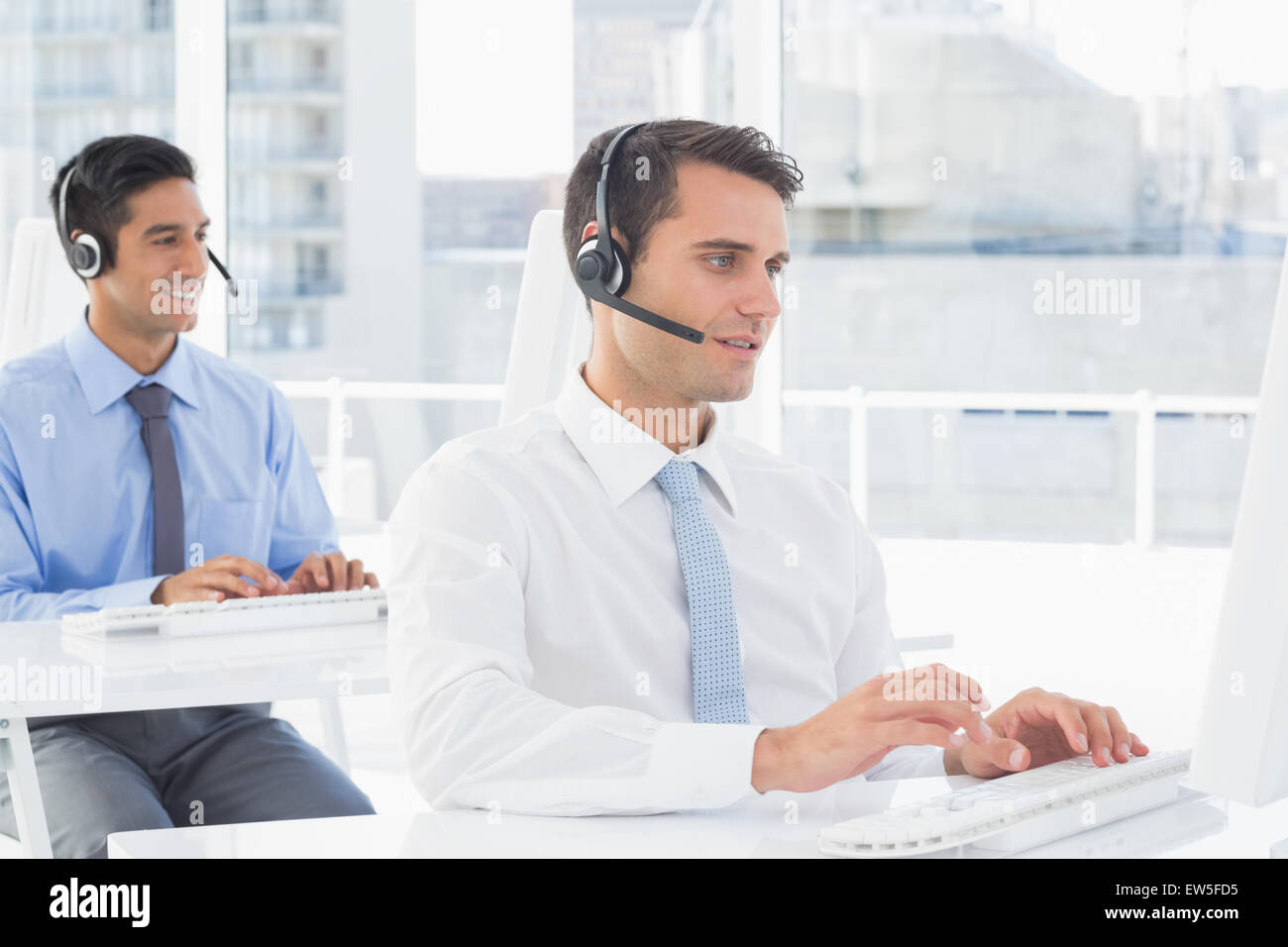 Concentrate work team using computer Stock Photo - Alamy