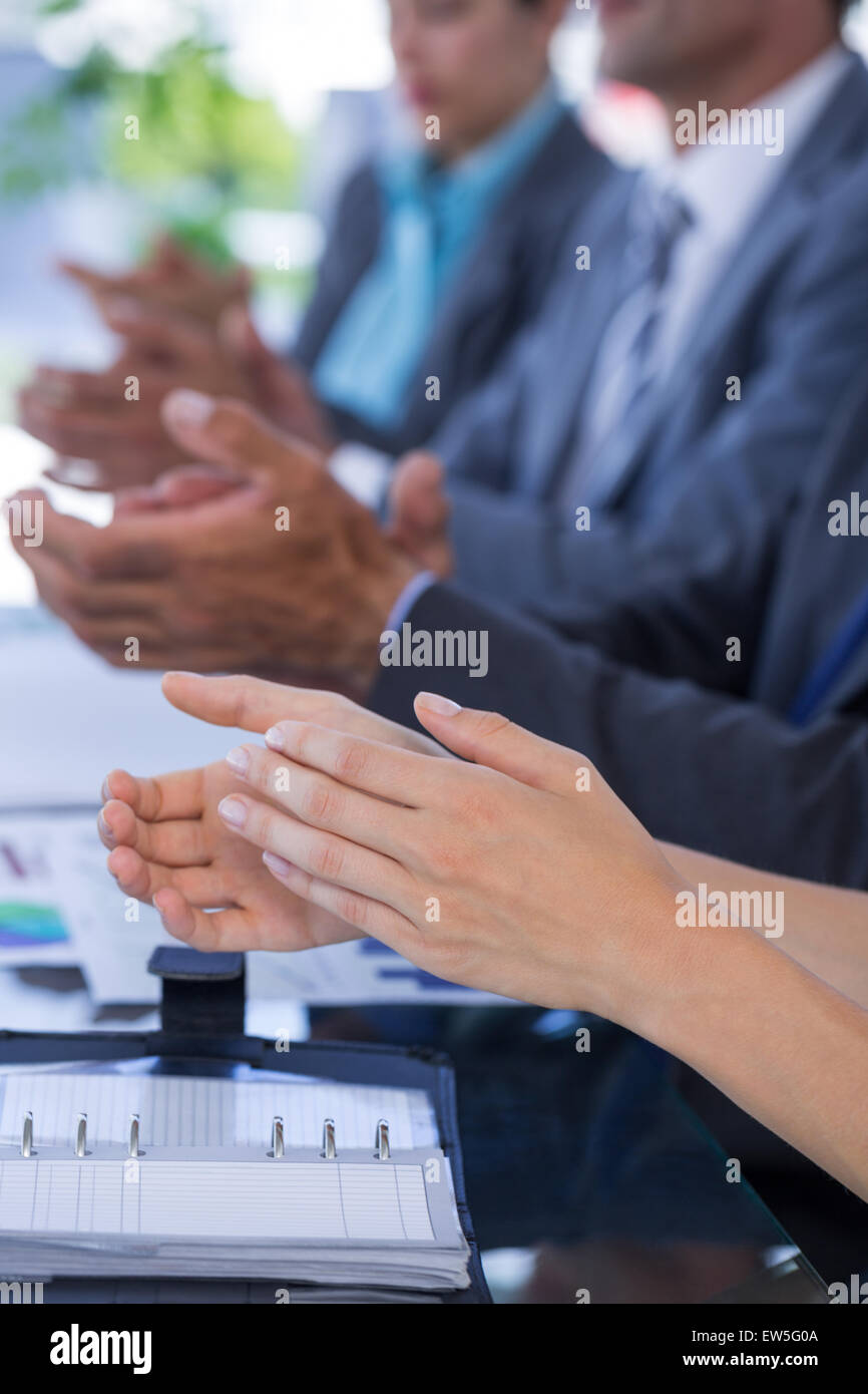 Business team clapping Stock Photo - Alamy