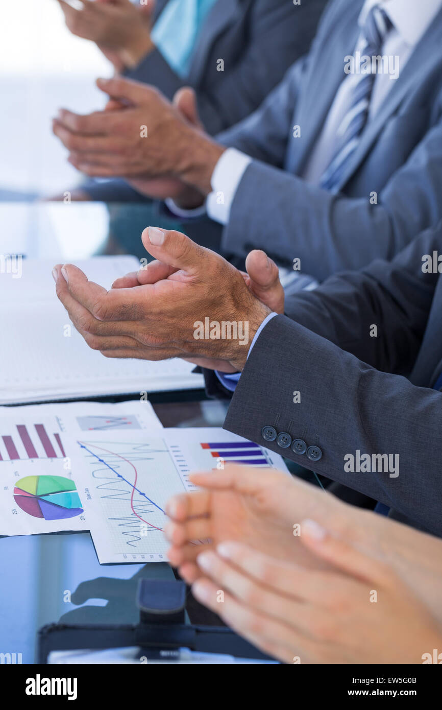 Business team clapping Stock Photo - Alamy