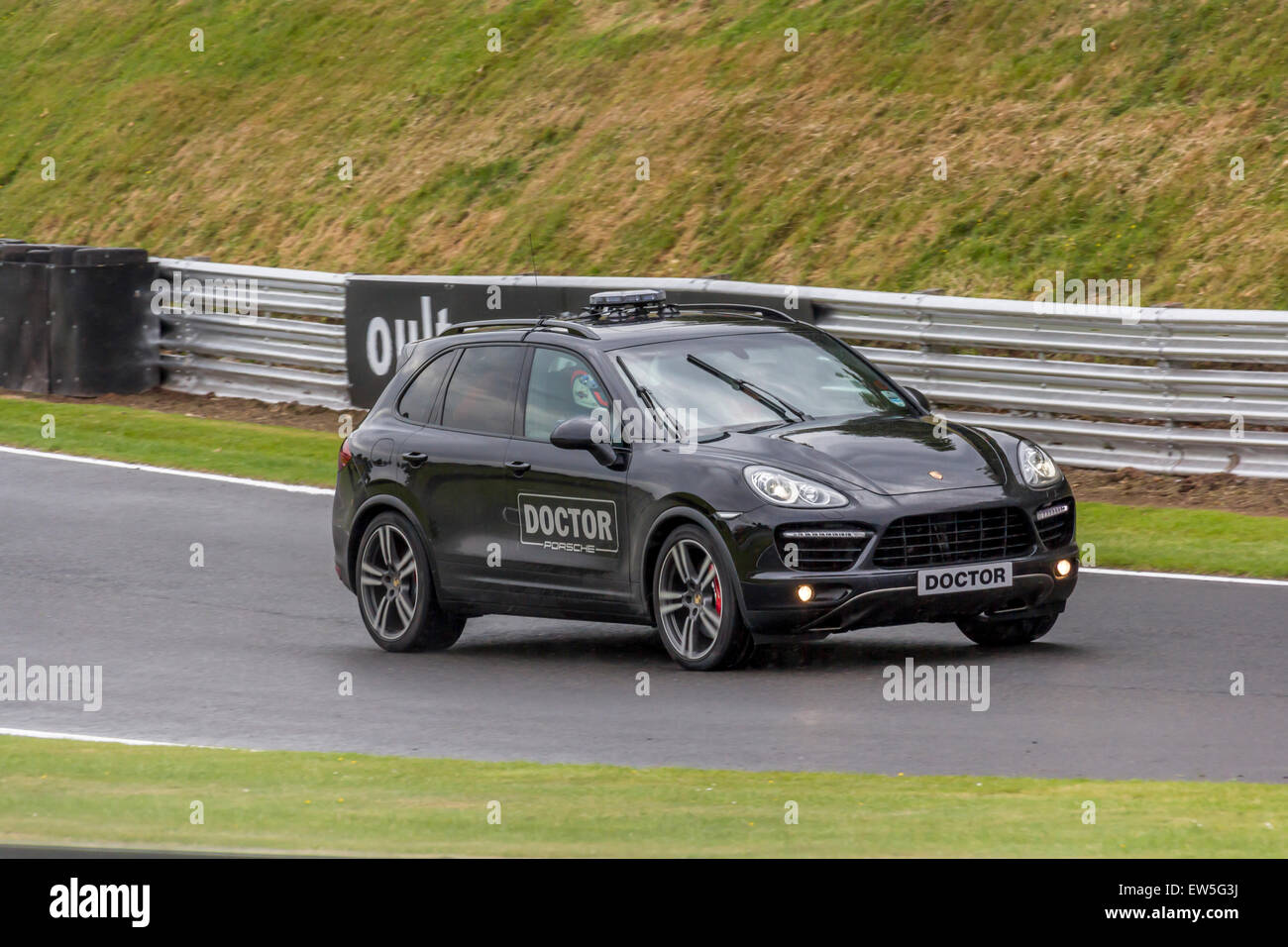 The race doctor following the racing cars at the beginning of the race ...