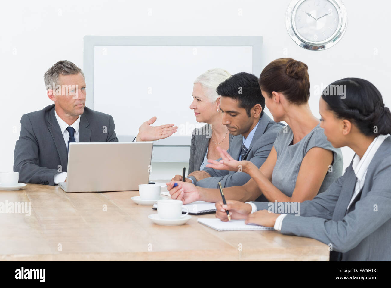 Business people in board room meeting Stock Photo - Alamy