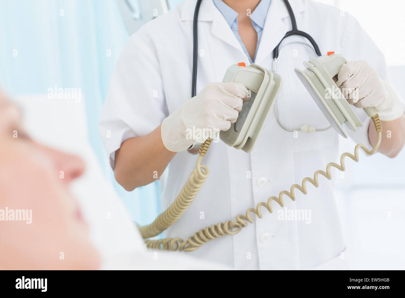 a doctor save a patient life Stock Photo - Alamy