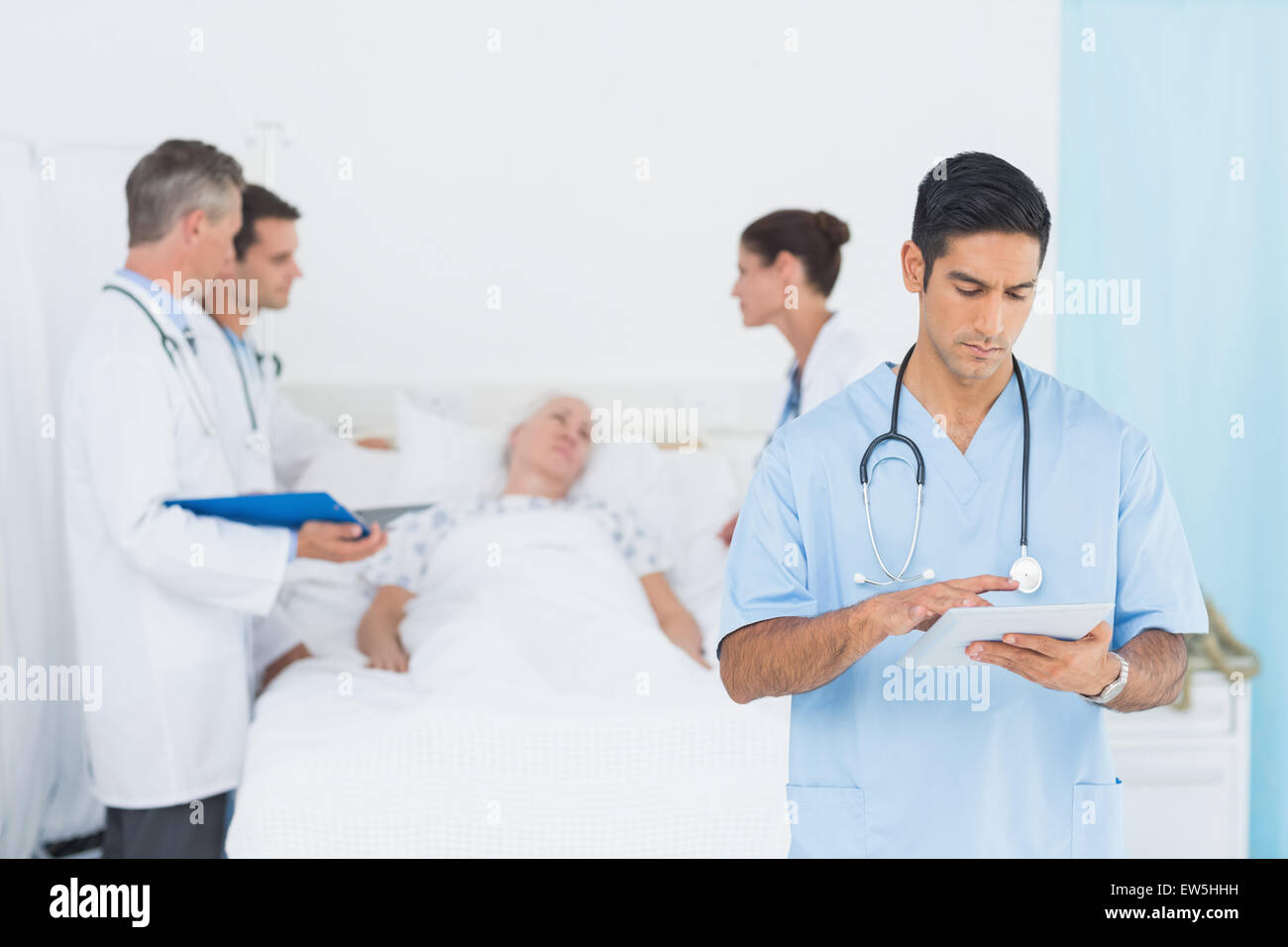 Report reading with patient behind Stock Photo - Alamy