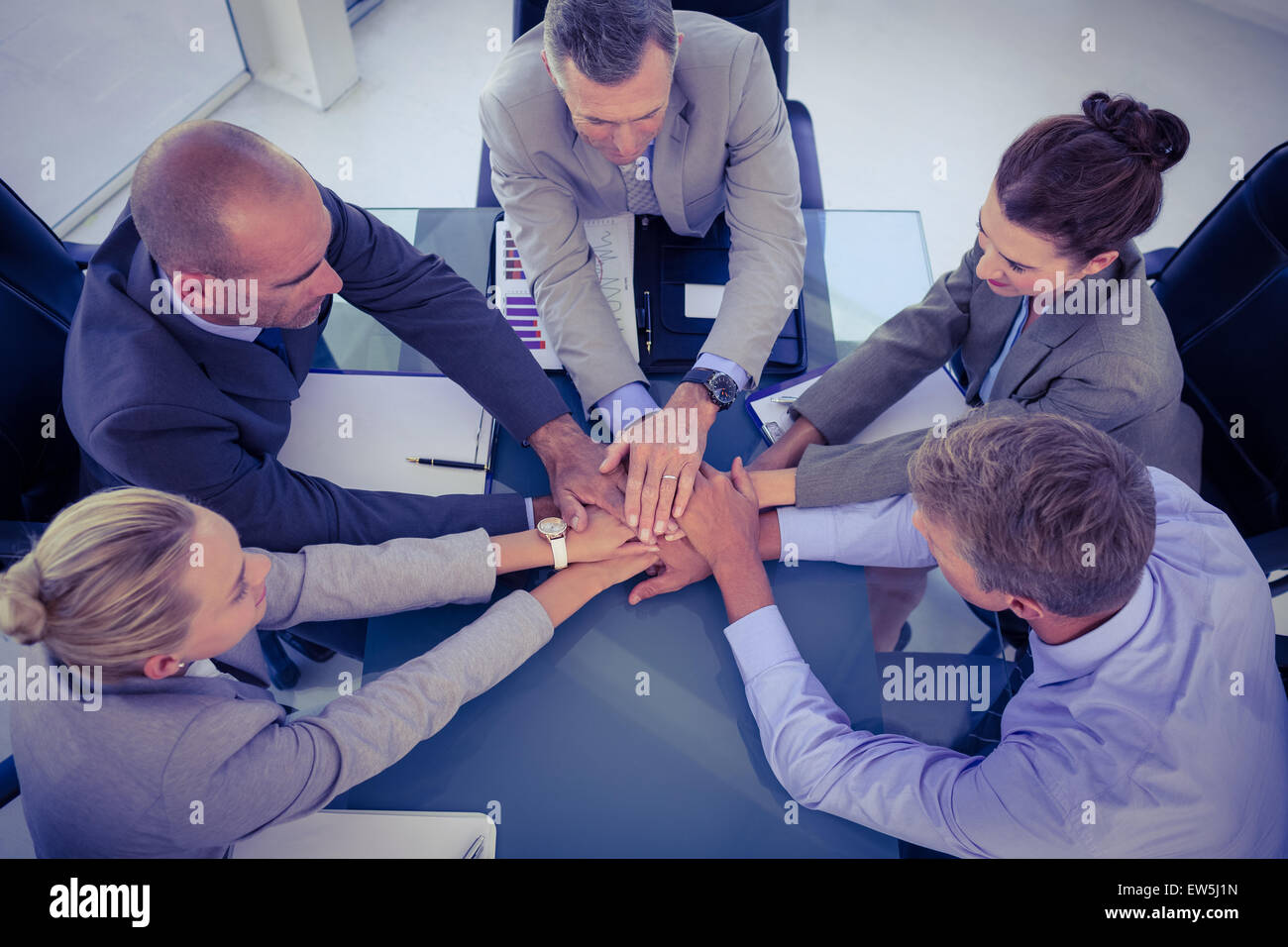 Business team putting their hands together Stock Photo - Alamy