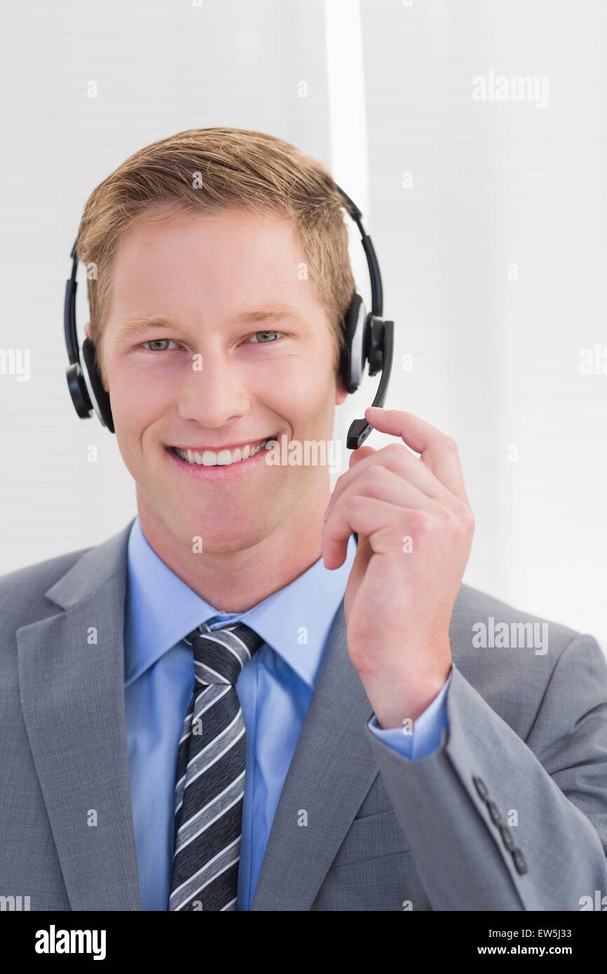 Handsome agent wearing headset Stock Photo - Alamy