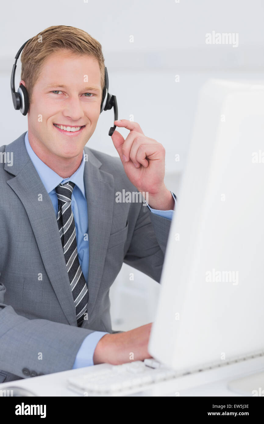 Handsome agent wearing headset Stock Photo - Alamy