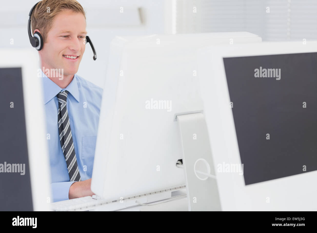 Handsome man typing on keyboard hi-res stock photography and images - Alamy
