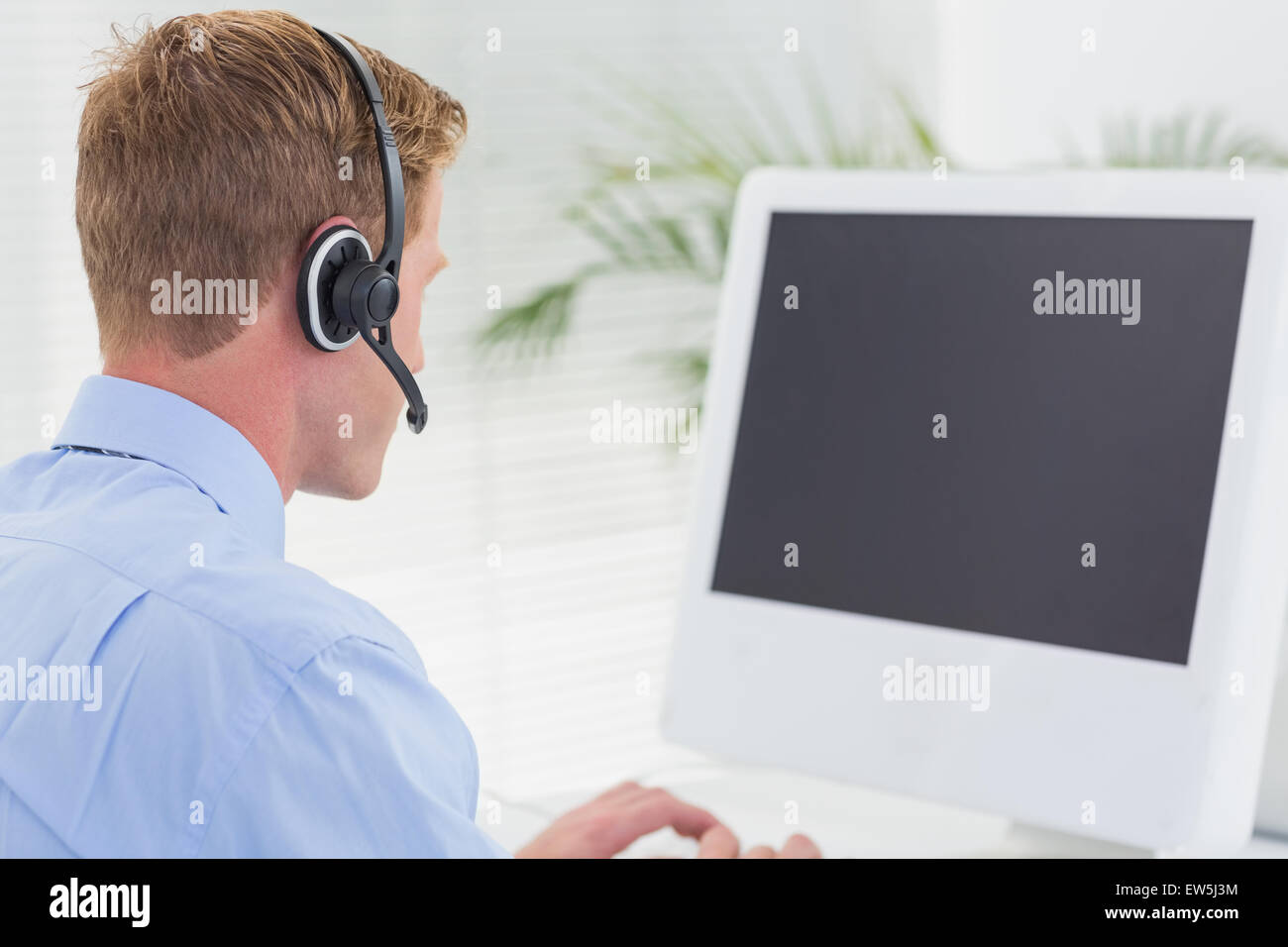 Agent on headset hi-res stock photography and images - Alamy