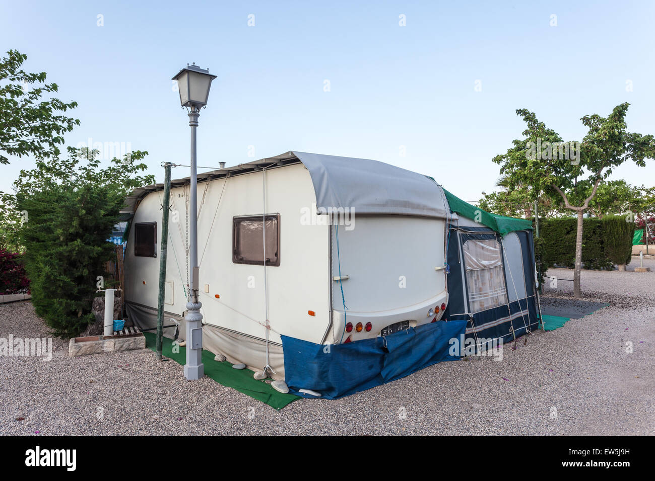 Caravan on a camping site Stock Photo - Alamy