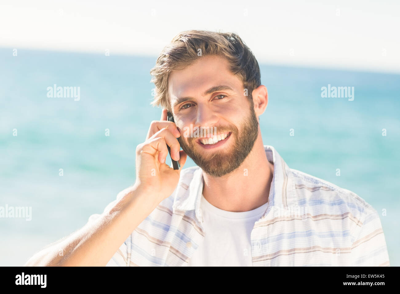 man using his phone Stock Photo - Alamy