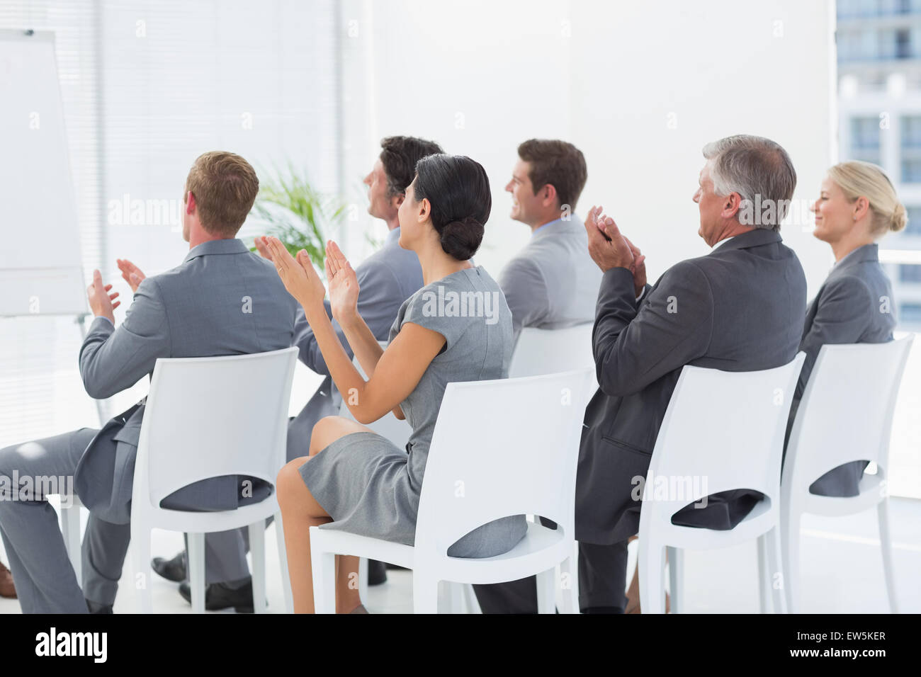 Successful smiling business team hi-res stock photography and images ...