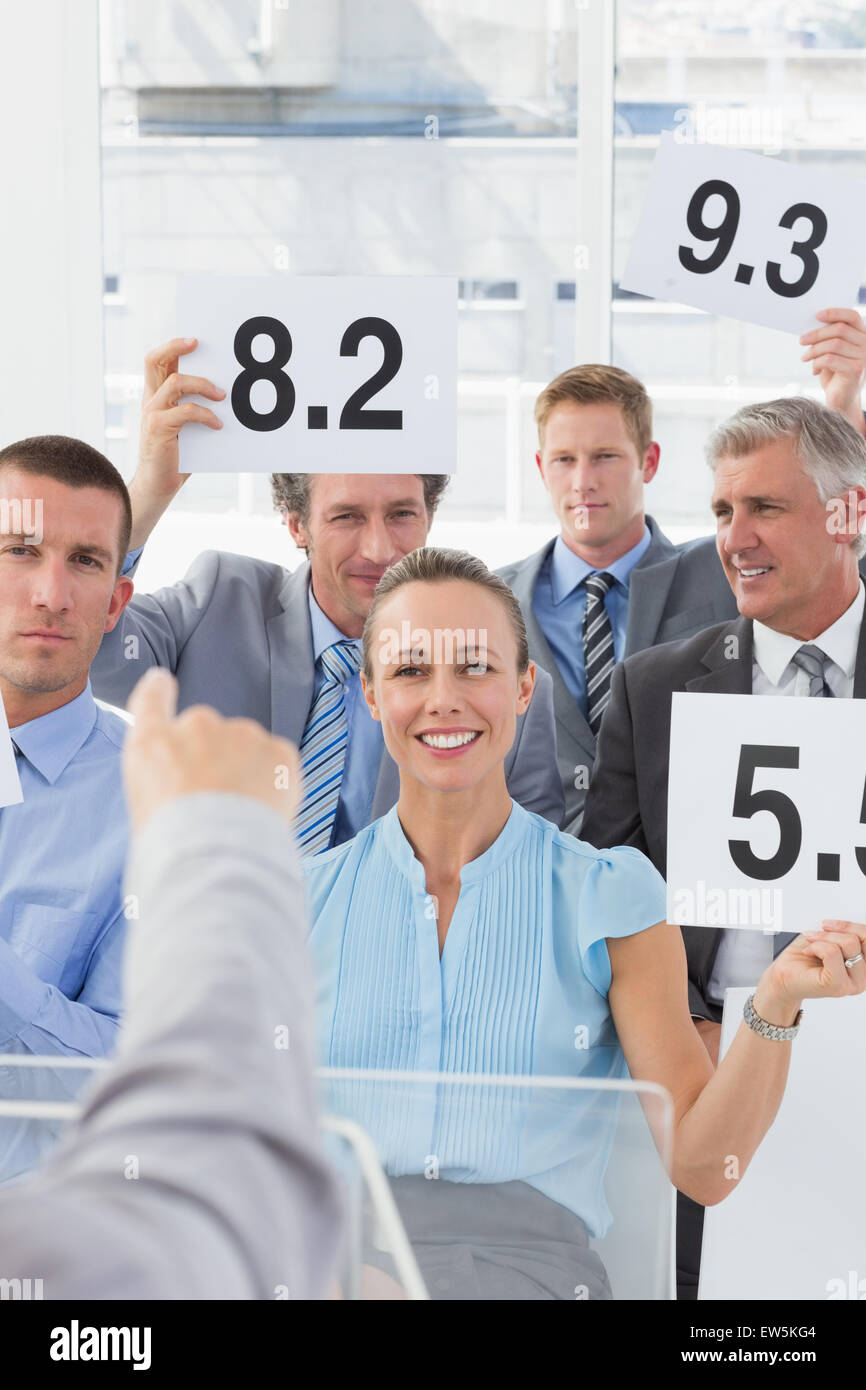 Business team giving mark after conference Stock Photo - Alamy