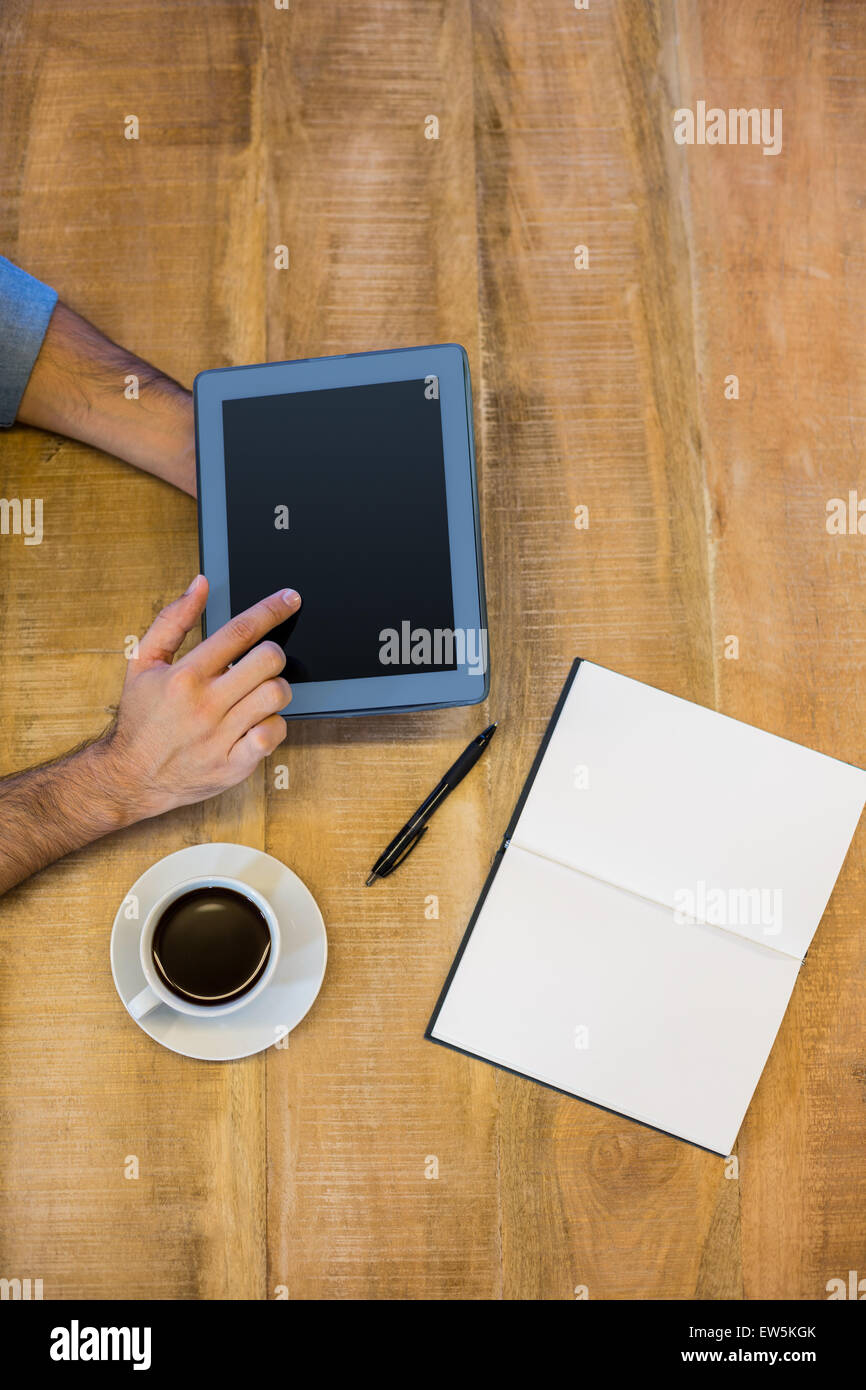 Man working on tablet Stock Photo - Alamy