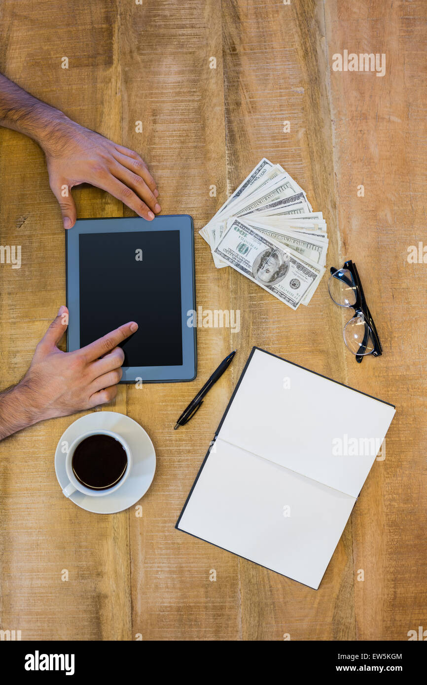 Man working on tablet Stock Photo - Alamy