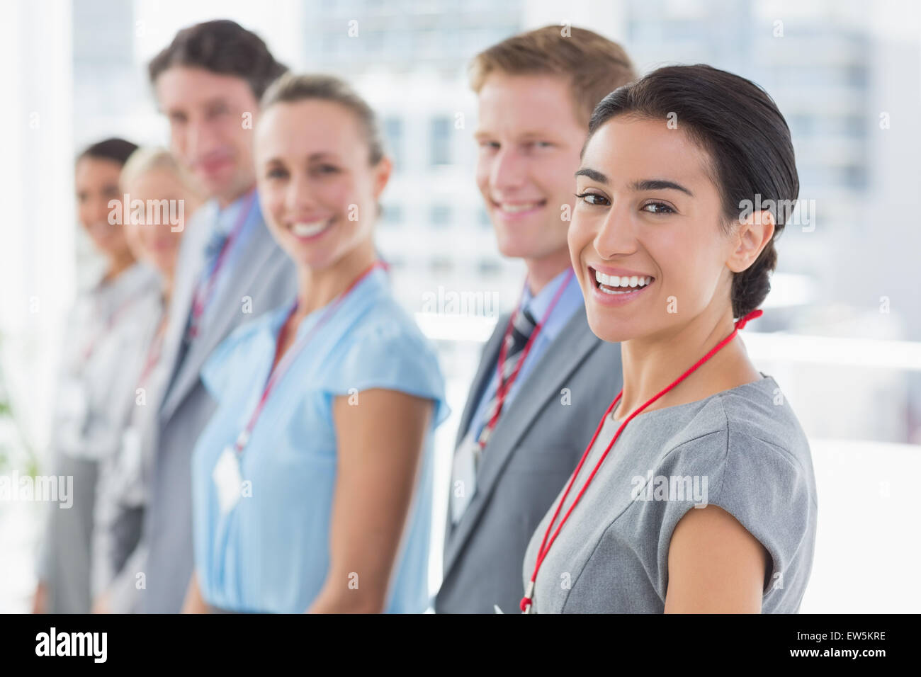 Business team standing in row hi-res stock photography and images - Alamy